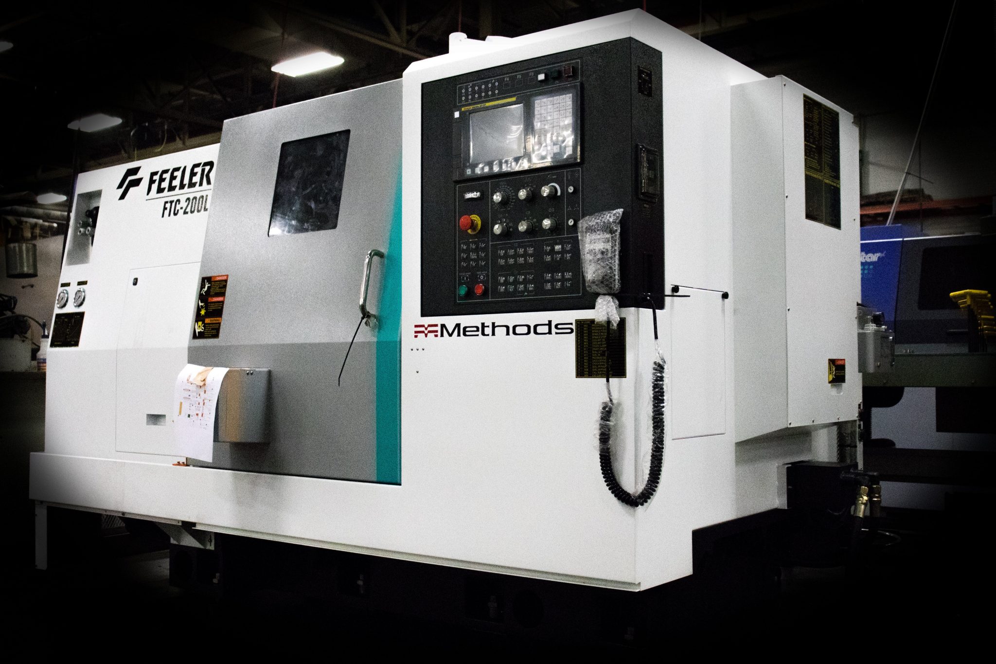 New CNC Machinery Announcement: Feeler FTC-200L